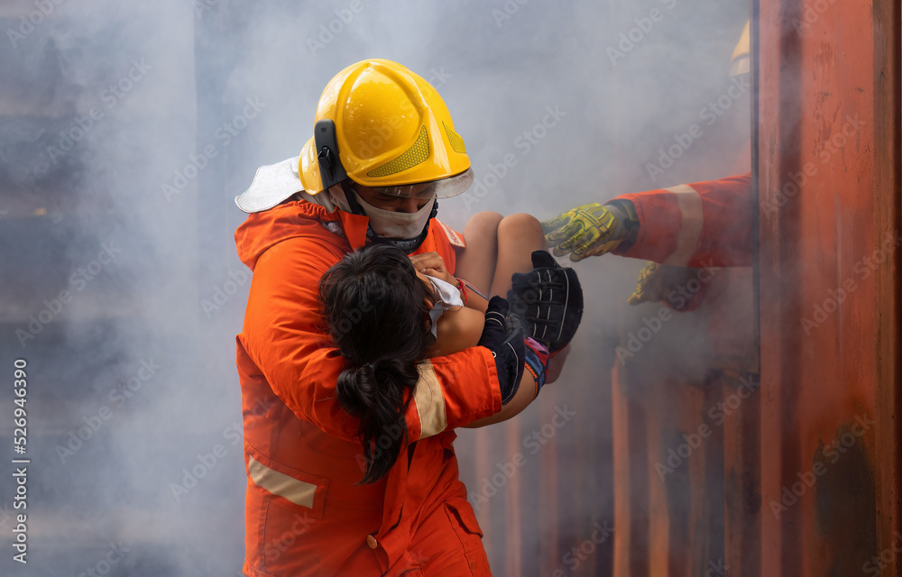 Fire fighting team emergency rescue life saving young girl from fire ...