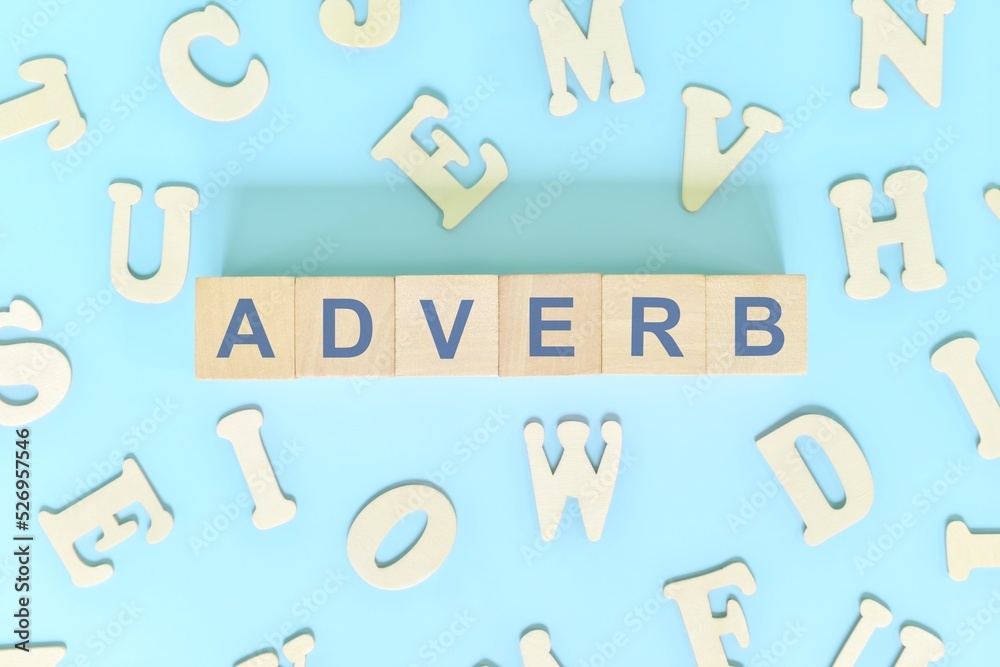 Adverb concept in English grammar and learning class lesson. Wooden ...