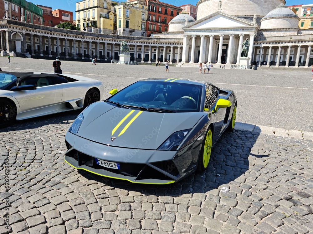 Super cars on street of the old town in Naples, Italy. Beautiful ...