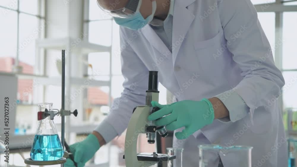 Research concept of 4k resolution. Asian scientists are examining the ...