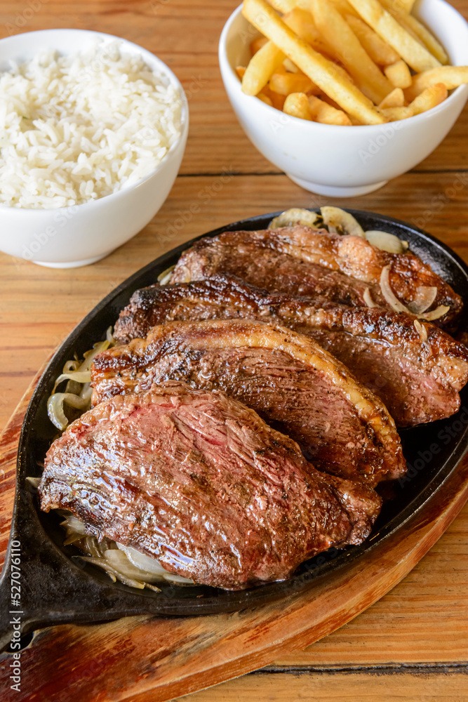 Picanha barbecue roasted on the grill and served in slices Stock Photo ...