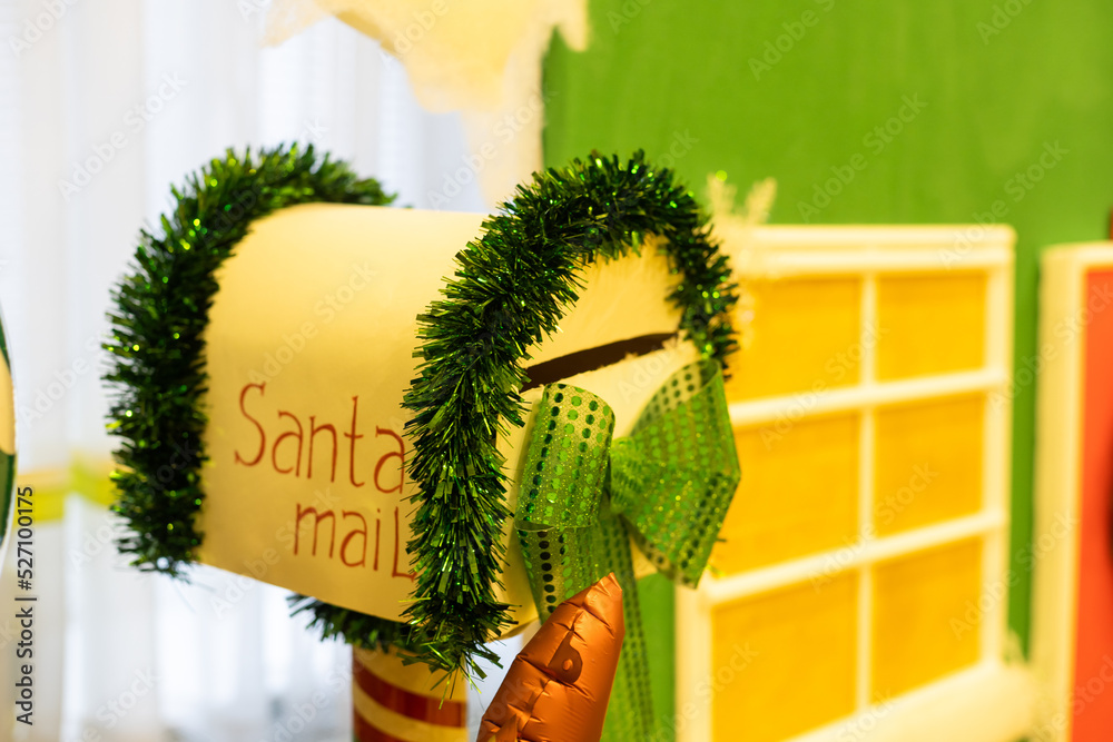 Christmas letter box to Santa with Christmas tree in the background ...