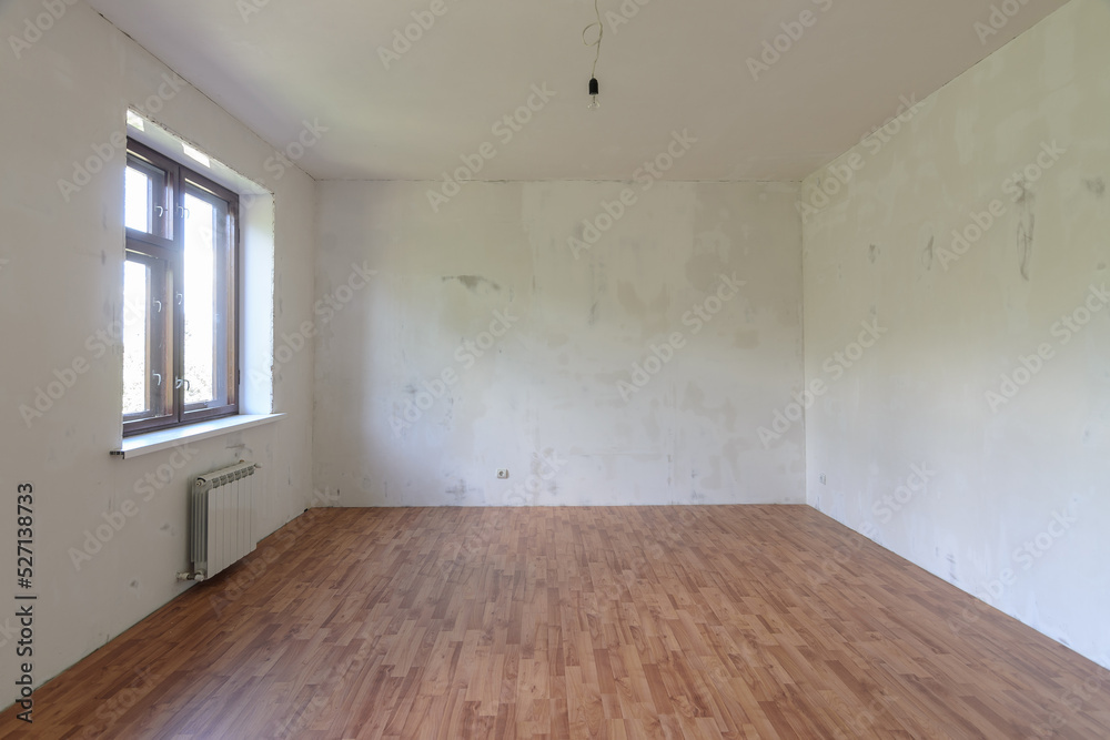 Interior of a small empty room with one window during renovation Stock ...