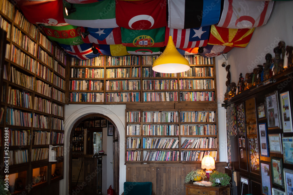 Many country flags in library interior with books. Stock Photo | Adobe ...