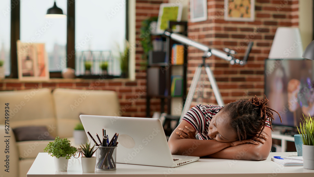 Tired stressed employee falling asleep on desk at remote work, feeling ...