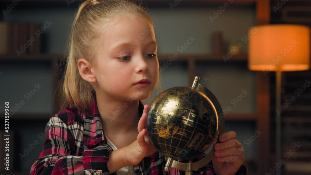 Female junior child schoolgirl pretty pupil looking and spinning ...
