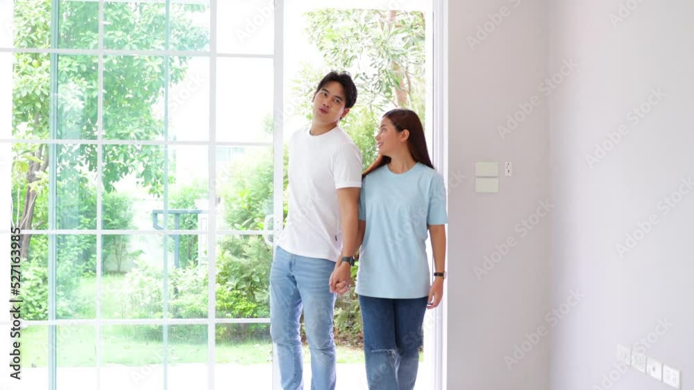 Happy asian family. Father, mother and daughter excited to move in new ...