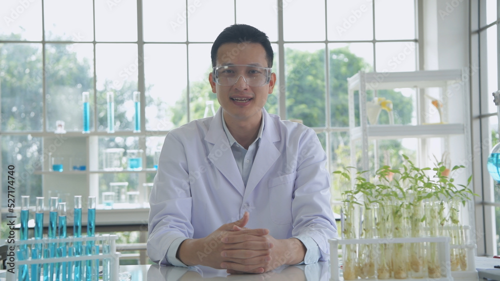 Research concept of 4k resolution. Asian scientists are describing ...