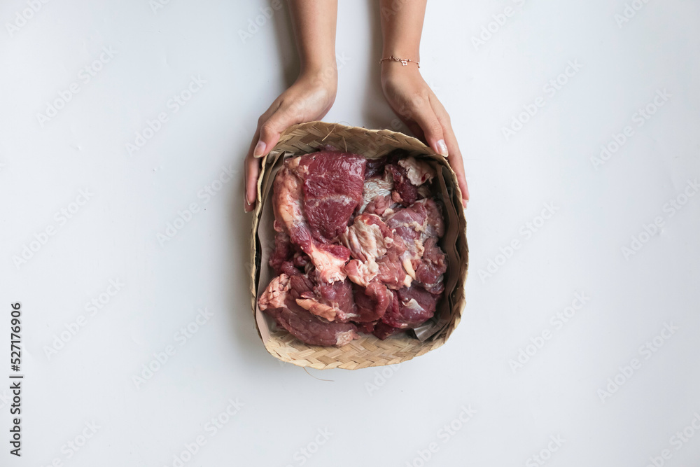 Top view of someone handing the raw meat on Eid al-Adha. Feast of ...