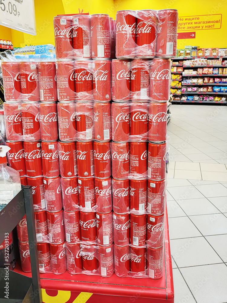 Minsk, Belarus. Aug 2022. Coca-Cola classic cans background. Packs of ...