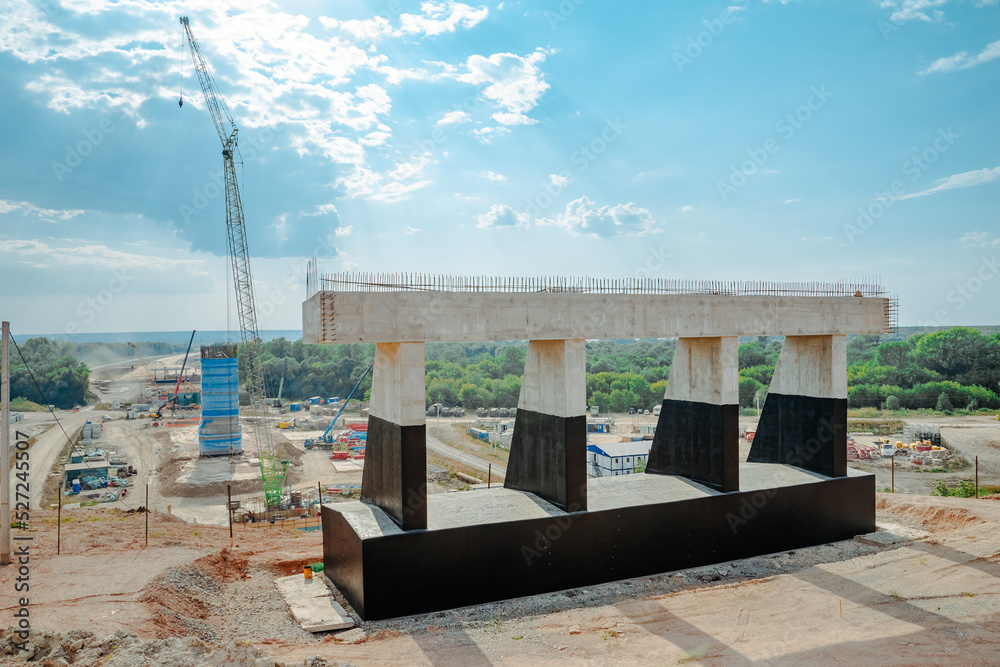 Constructing concrete pillars of the bridge. Construction of the new ...