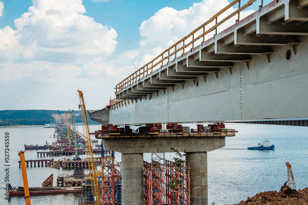 Constructing concrete pillars of the bridge. Construction of the new ...