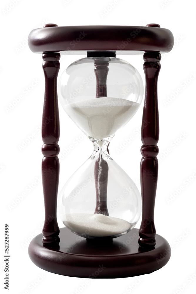 Sand flowing in transparent hourglass used to measure the passing of ...