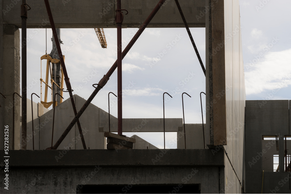 Building construction site with precast concrete elements and ...