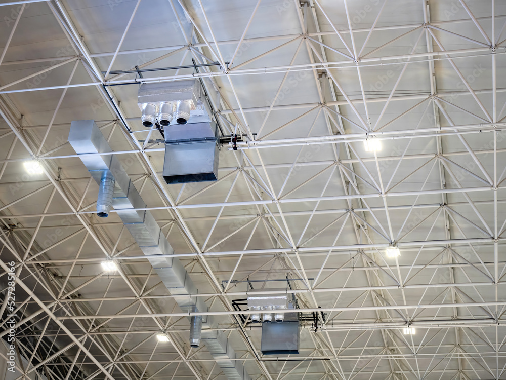 Ventilation shafts under roof. ceiling with metal structures. Lighting ...
