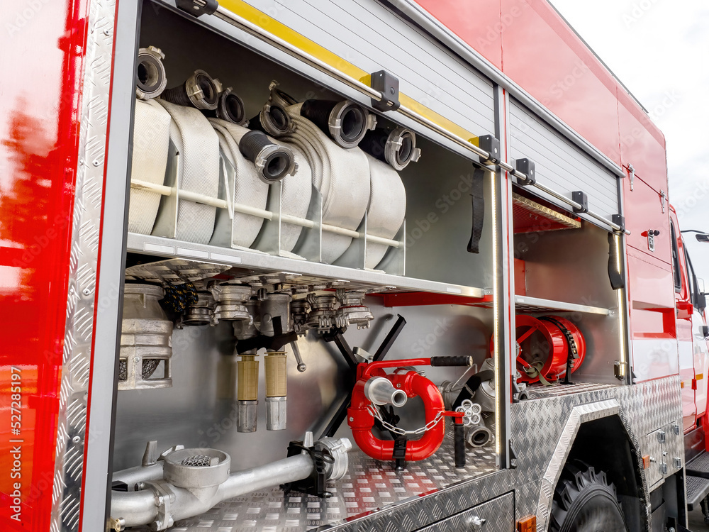 Fotografia do Stock: Fire service vehicle. Cabinets for fire equipment ...