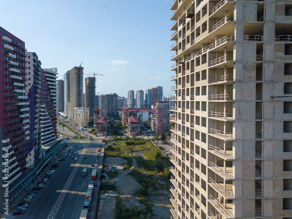 Drone view of an almost completed residential multi-storey building ...
