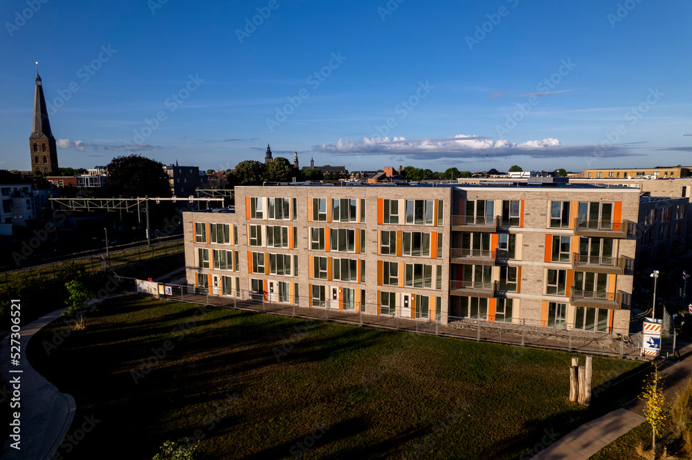 Final construction phase showing exterior facade aerial of real estate ...