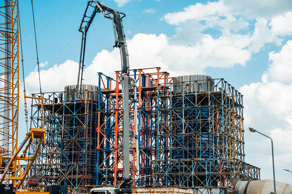 Constructing concrete pillars of the bridge. A view of newly ...