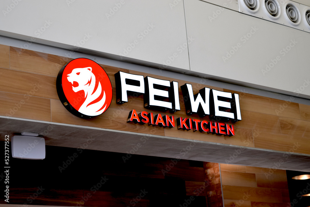 Sign and logo of Pei Wei Asian Cuisine Restaurant at Detroit Airport in February 2020. American ...