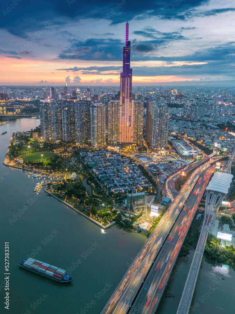 Aerial sunset view at Landmark 81 - it is a super tall skyscraper and ...