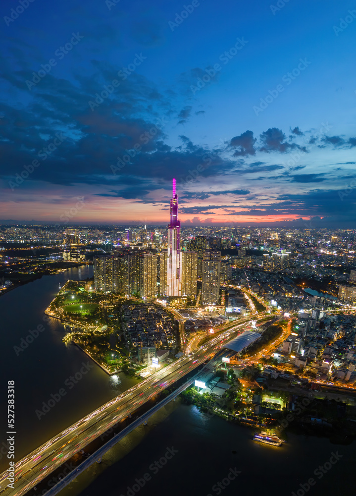 Aerial sunset view at Landmark 81 - it is a super tall skyscraper and ...