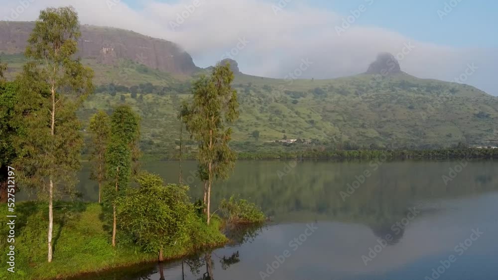 Reflections On Calm Lake Near Trimbakeshwar Mountain Range In Western ...