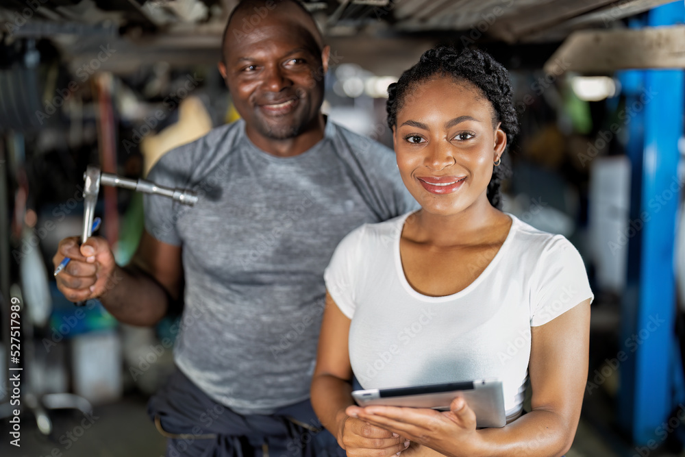 Mechanical girl wearing half overall cover suit hold checklist talking ...