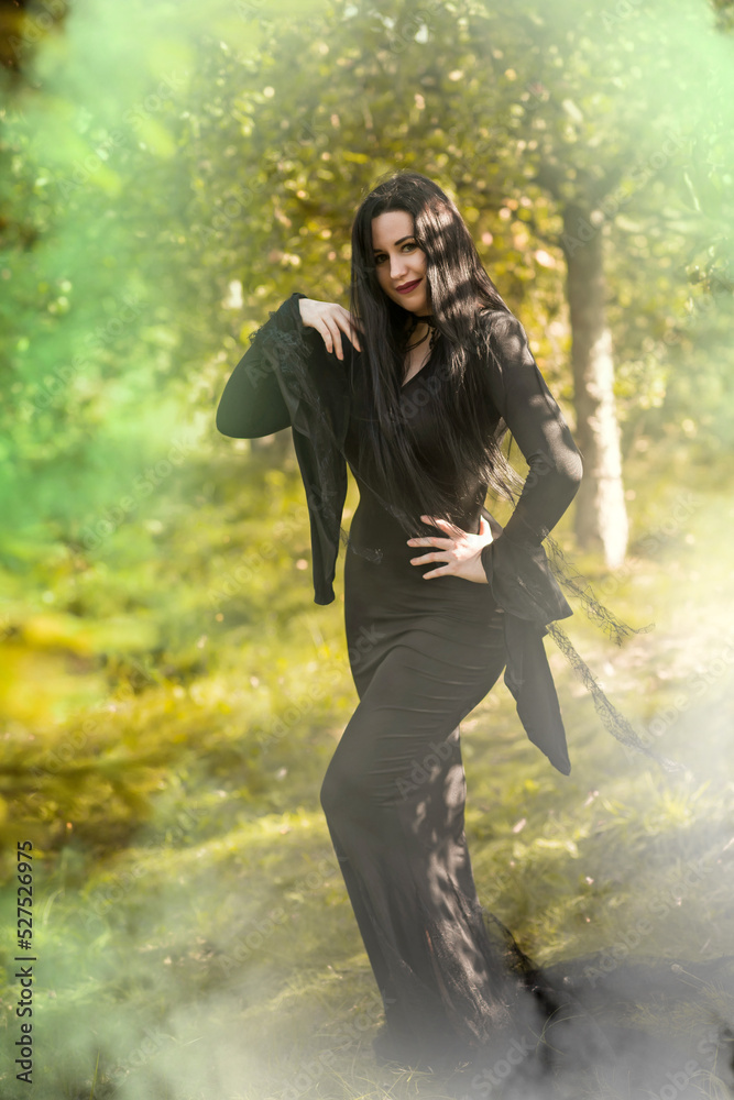 Halloween time, witch Lady in Mystical atmosphere, witchcraft concept ...