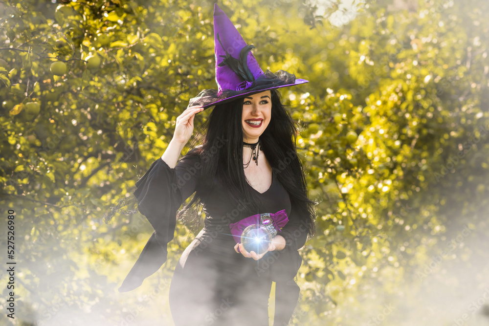 Halloween time, witch Lady in Mystical atmosphere, witchcraft concept ...