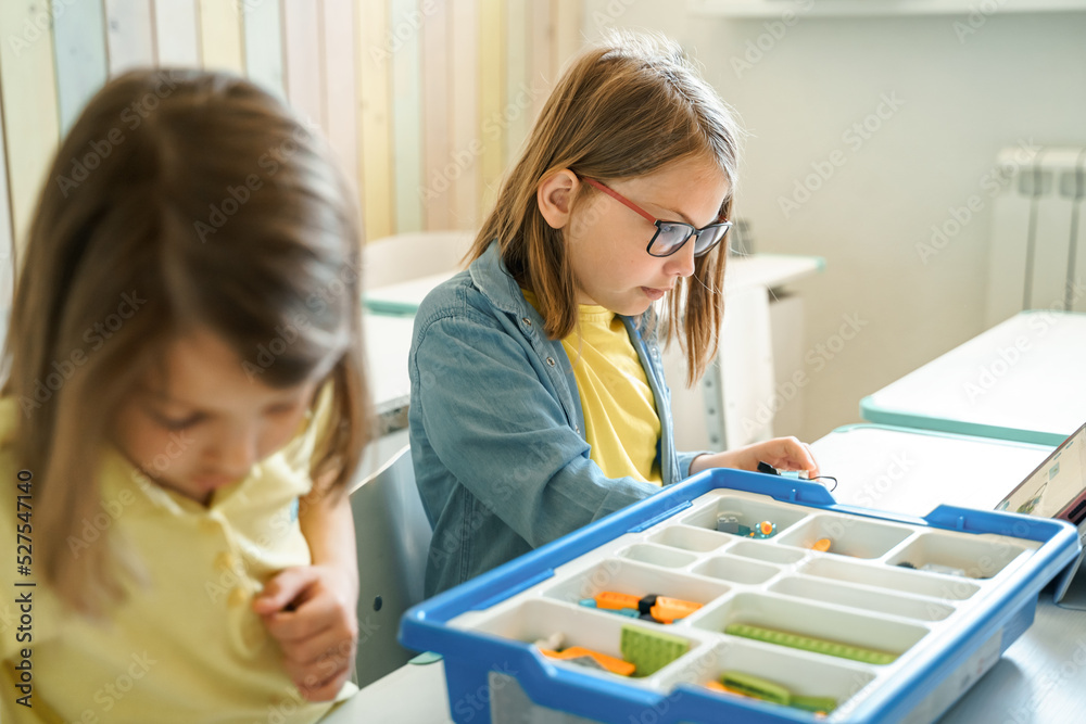 Programming work, learning robotics in elementary school. Children ...