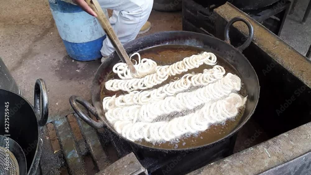 Jalebi is a famous Indian sweet. This shows how jalebi is 1st fried in ...