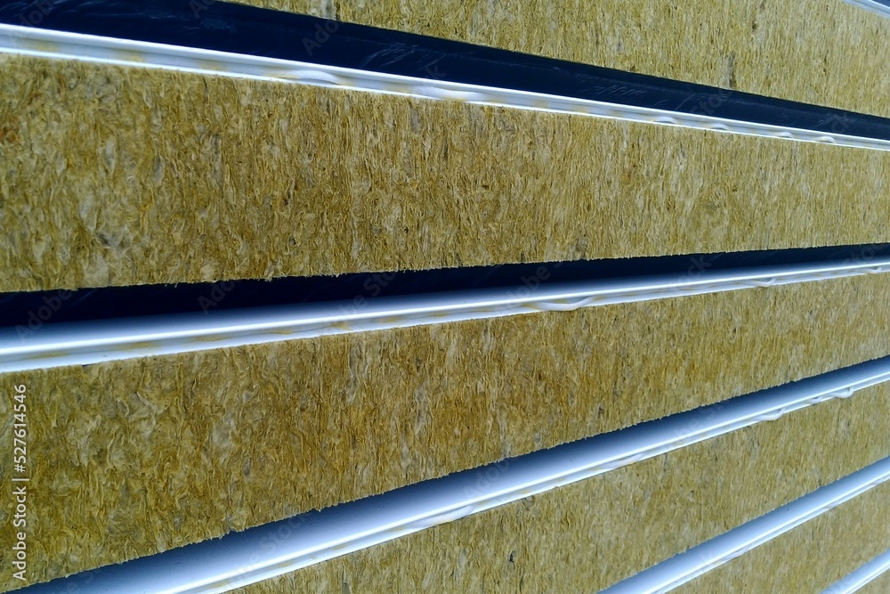 Sandwich panels with mineral wool filling, side view, a stack of panels ...