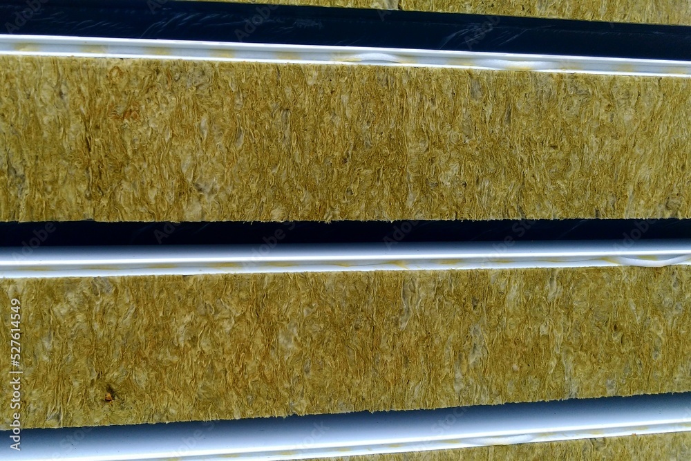 Sandwich panels with mineral wool filling, side view, a stack of panels ...