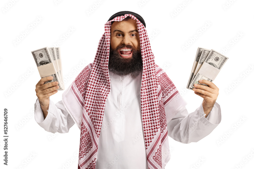 Excited saudi arab man holding stacks of money Stock Photo | Adobe Stock