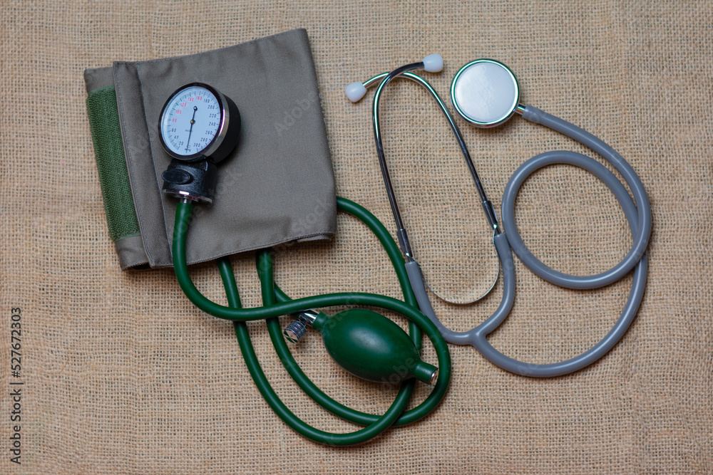 Digital Blood Pressure Machine on jute background Stock Photo | Adobe Stock