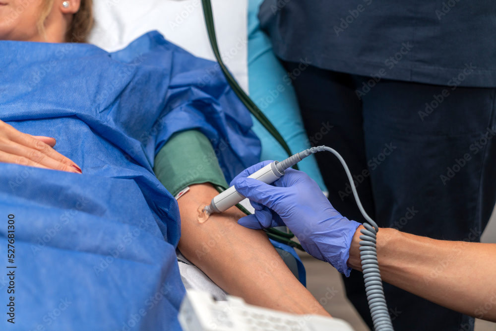 blood pressure measurement in the arm with the device, Ankle Brachial ...