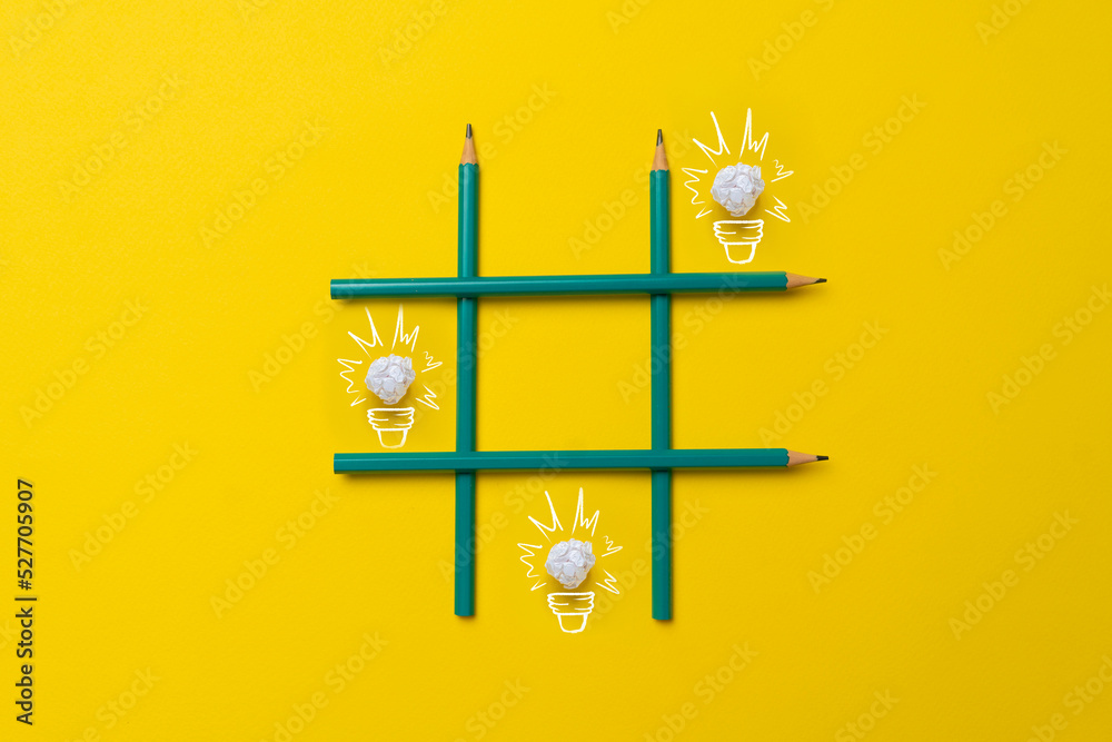 simple creative idea of drawn paper light bulbs in the tic tac toe grid ...