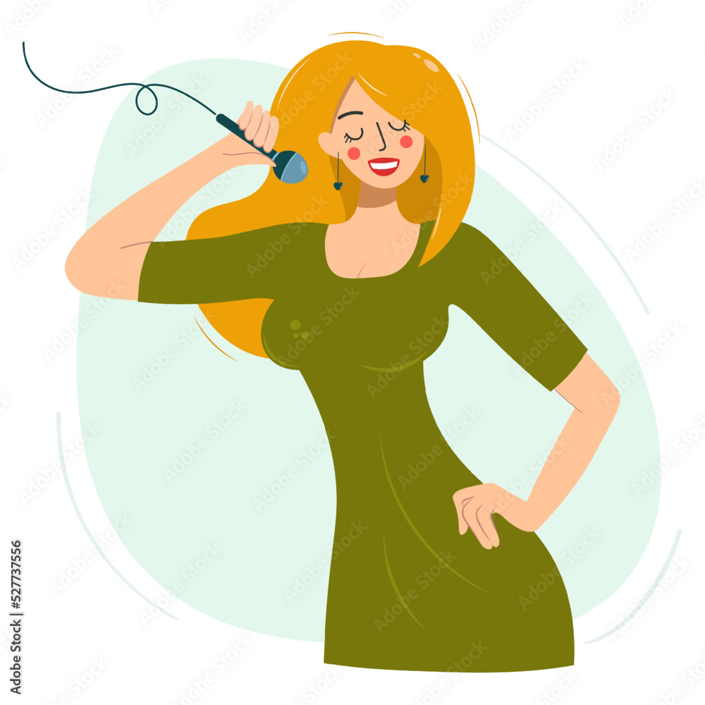 A beautiful girl in a green dress sings. Young singer with a microphone ...