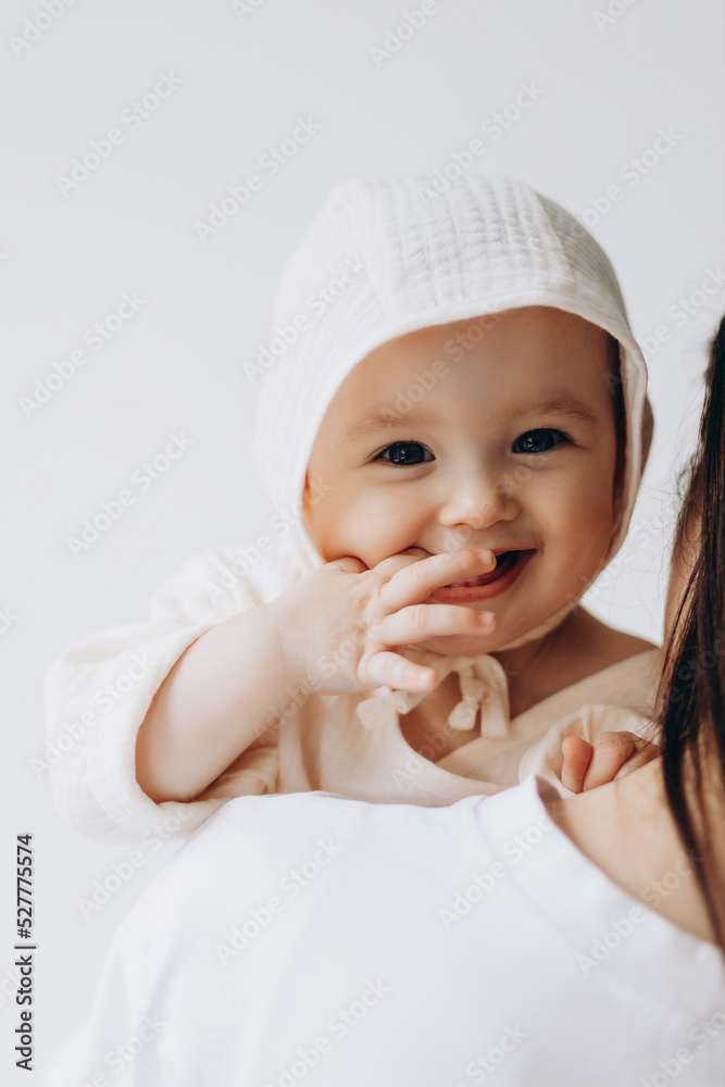 Loving Mother Carying Of Her Newborn Baby At Home Bright Portrait Of loving-mother-carying-of-her-newborn-baby-at-home-bright-portrait-of