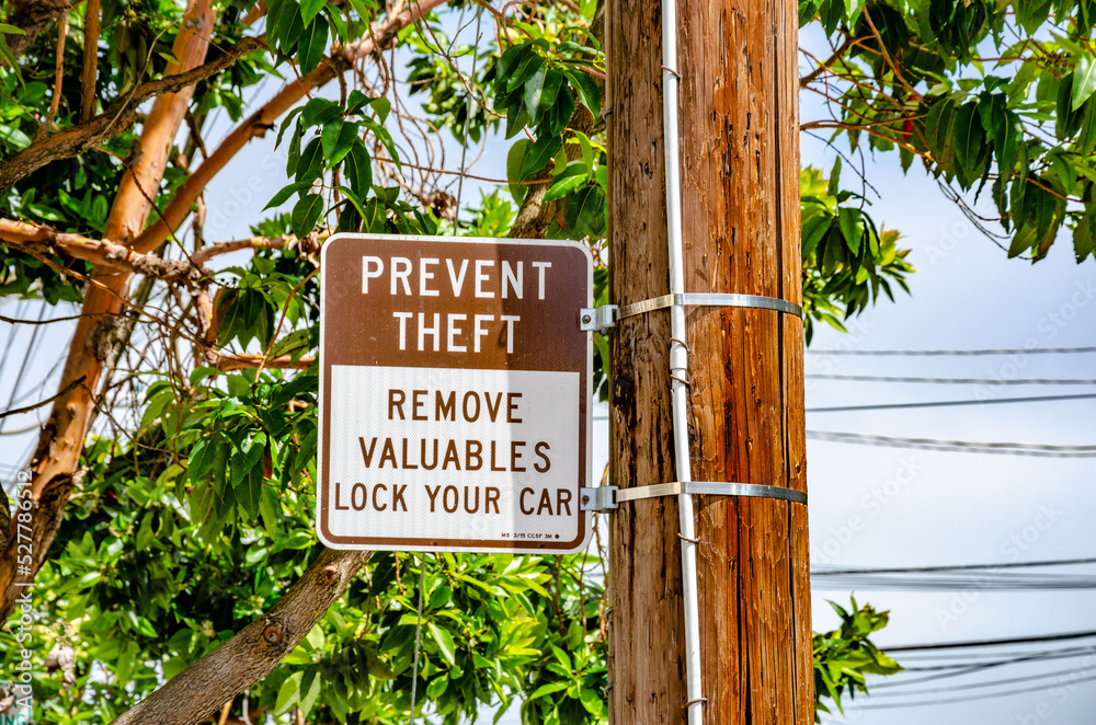A brown sign attached to a telegraph pole in Sand Francisco, California ...