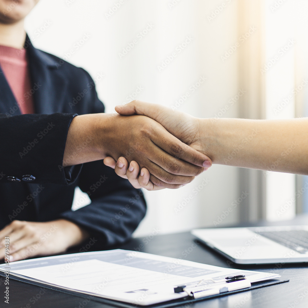 Employer or HR department welcomes new employees, Shaking hands with ...
