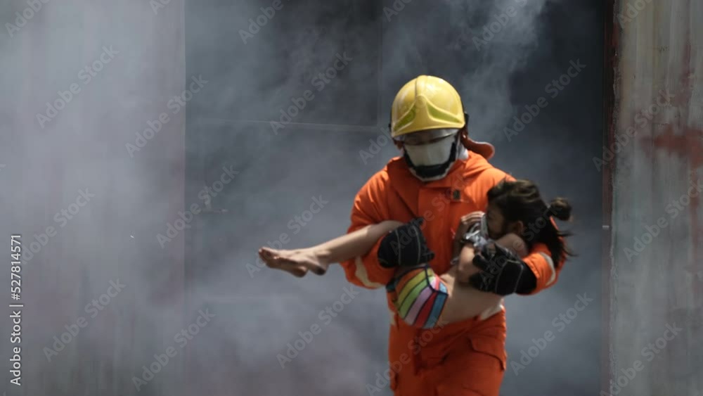 Fire fighting team emergency rescue life saving young girl from fire ...