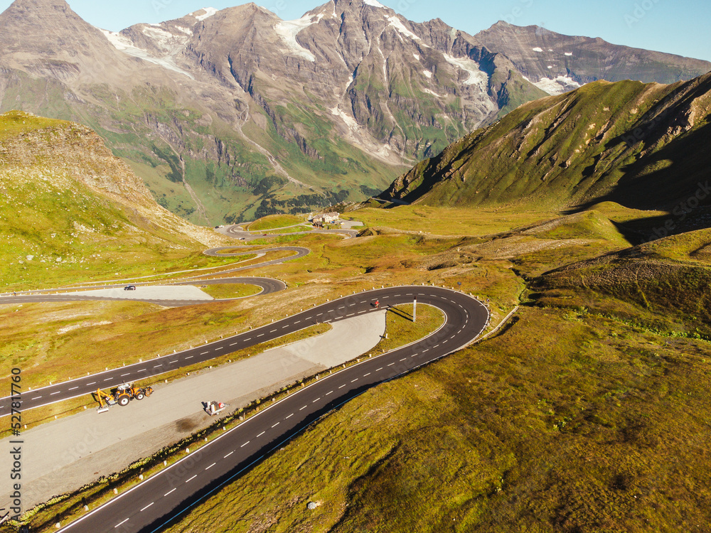 Bird's eye view of serpentine curves at sunny day. Aerial view of ...