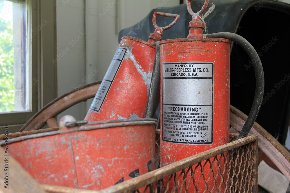 antique hand-pump fire extinguishers Stock Photo | Adobe Stock