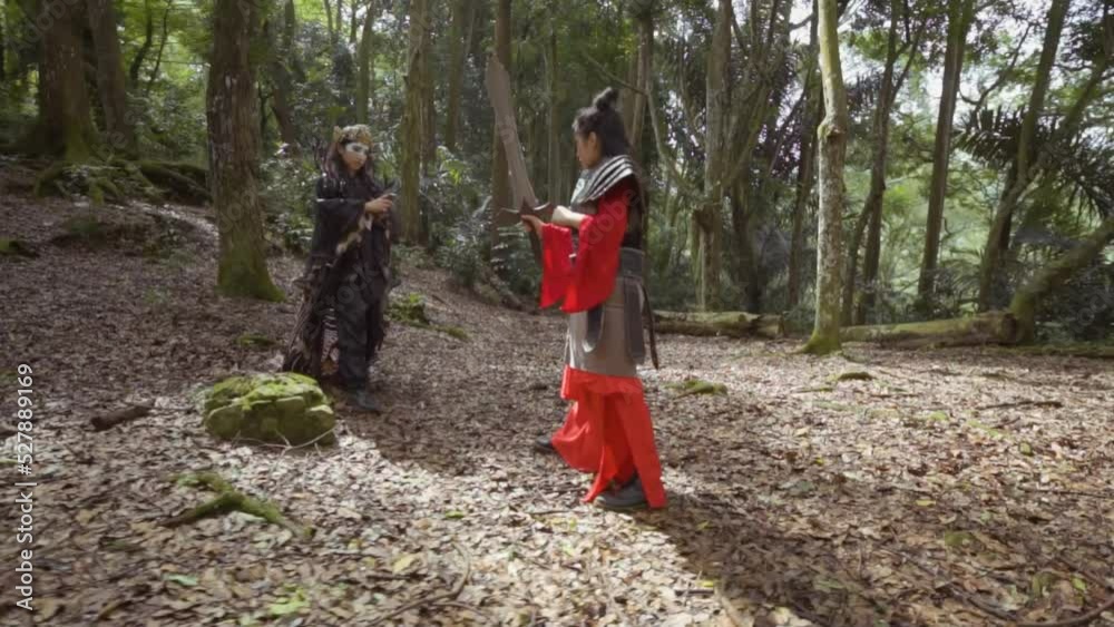 Armored Chinese women fighting each other in Halloween costumes inside ...