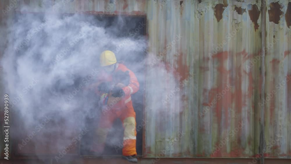 Video „Fireman or firefighter carry or hold little girl run out from ...