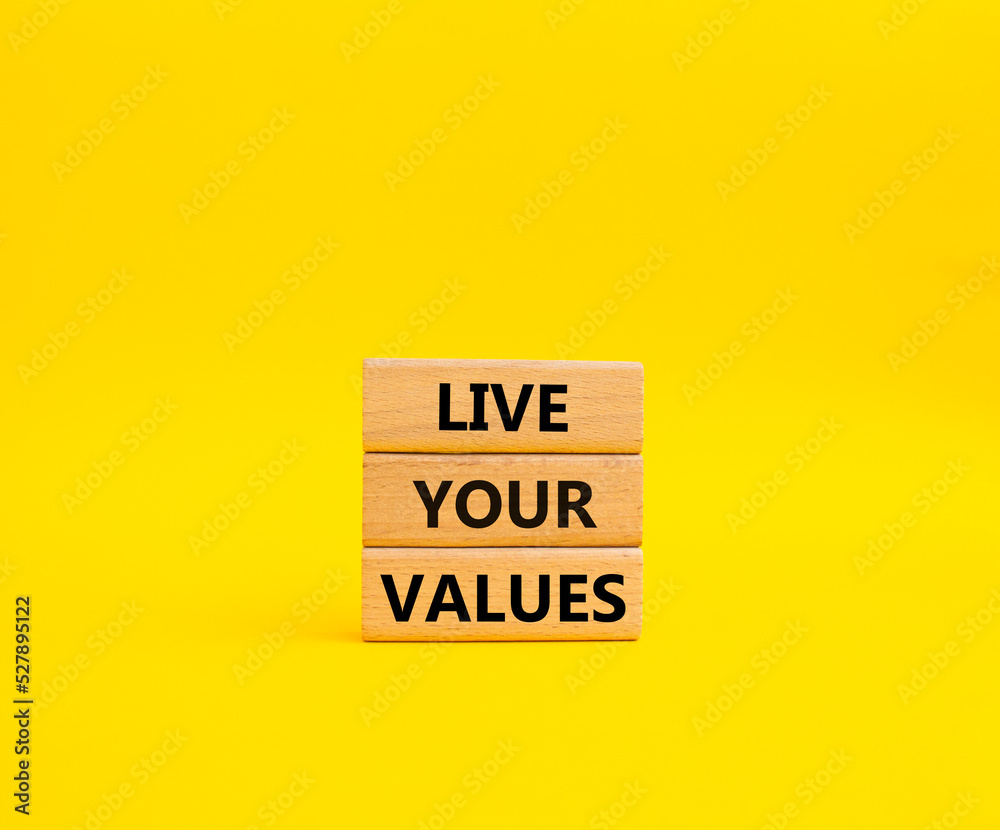 Live your values symbol. Concept words 'Live your values' on wooden ...