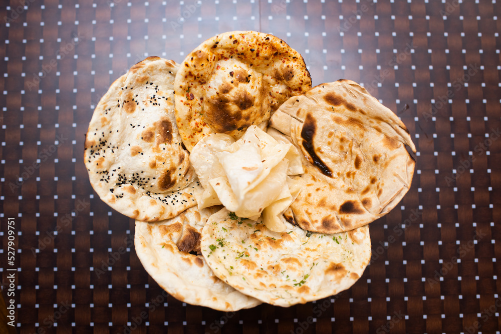 Assorted Indian Bread Basket, sada roti, butter naan, garlic naan ...