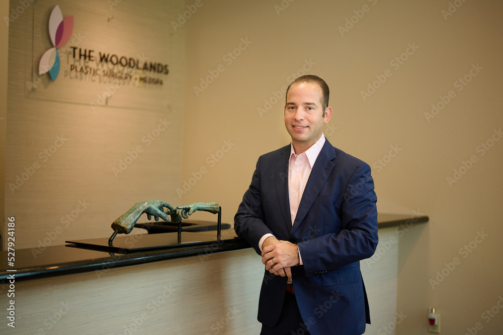 THE WOODLANDS, TEXAS - SEPTEMBER 1ST 2022: Doctor is posing in a suit ...
